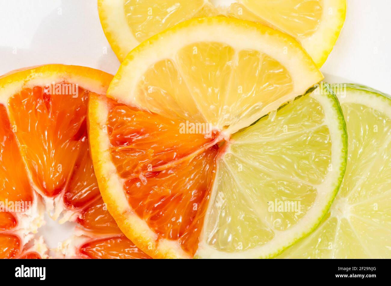 detail of red orange, lime and lemon slice combined together Stock ...