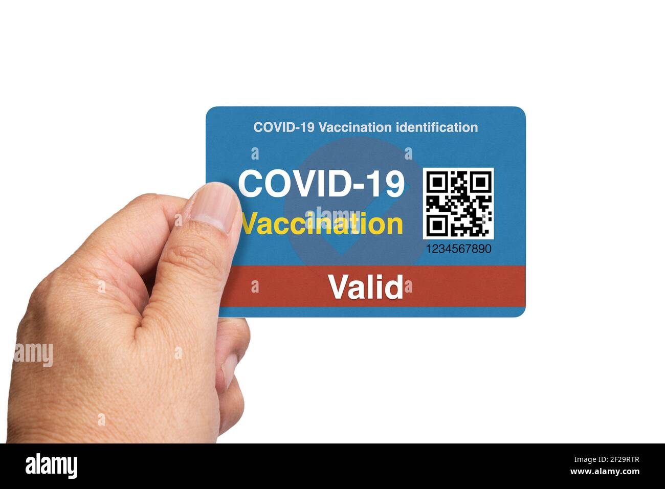 Hand holding covid-19 vaccination identification card on white ...
