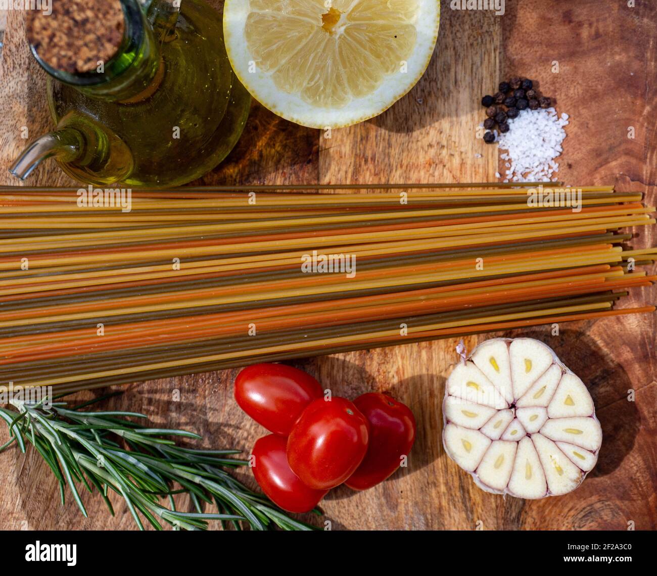 Multi-colored spaghetti pasta cooked for lunch Stock Photo - Alamy