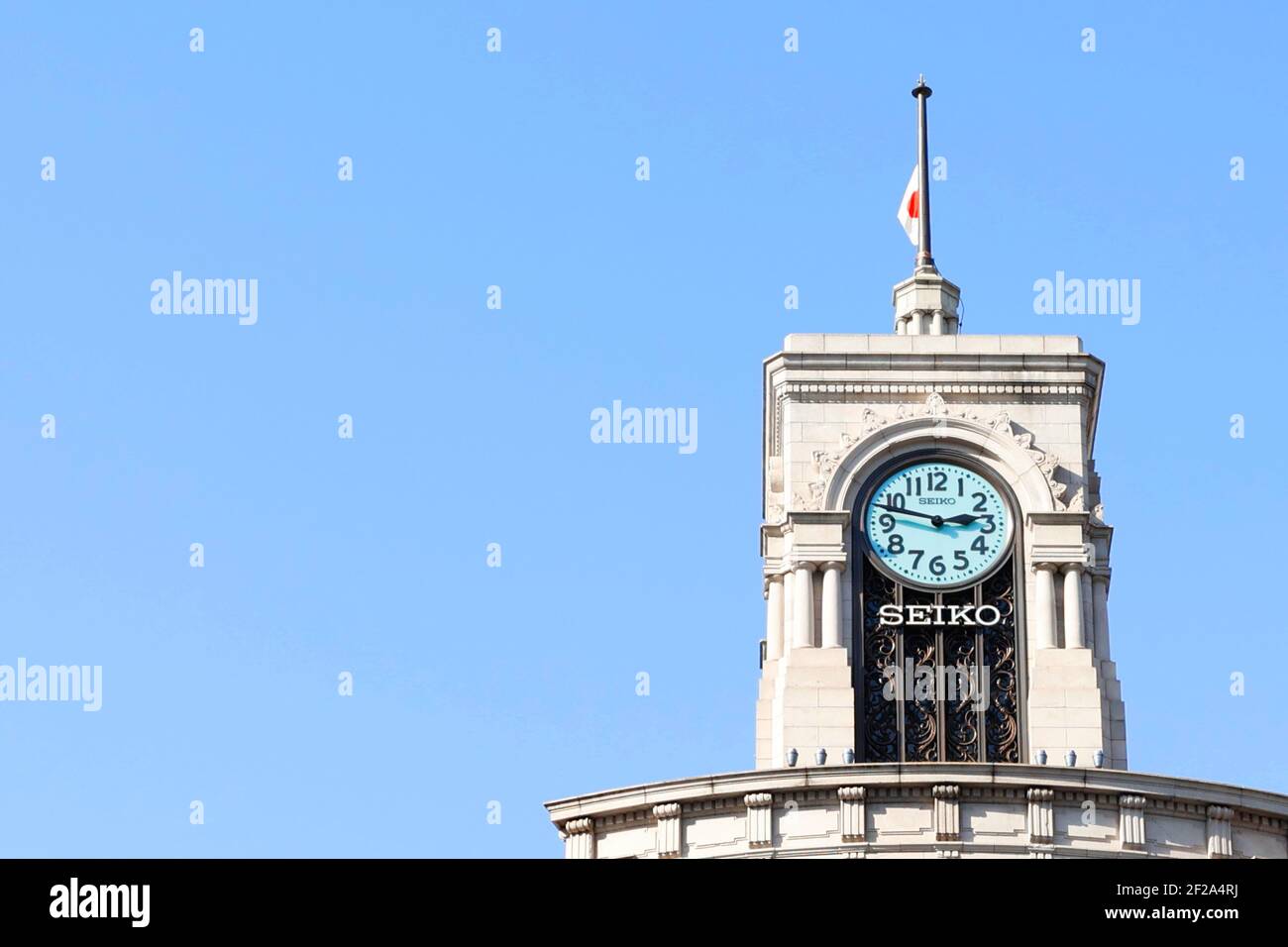 Tokyo, Japan. March 11, 2021: A Japanese national flag flies at half ...