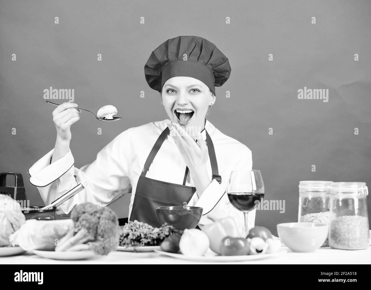 Cooking meal. Girl at kitchen table. Cooking food and housekeeping ...