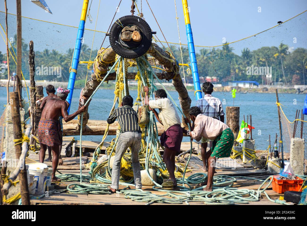 Indian Fishermen, Chinese Fishing Nets, Kochi, Cochin, Kerala, India ...