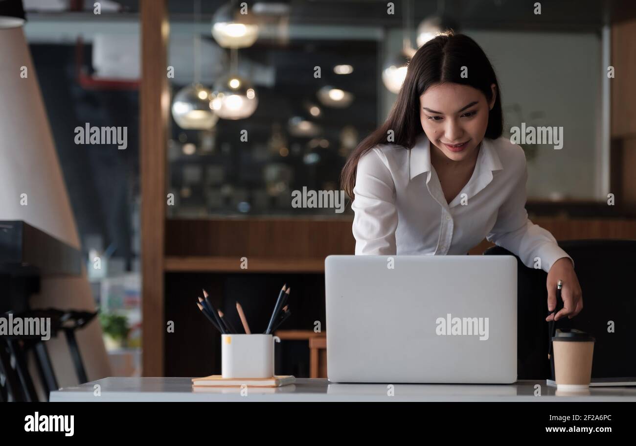 Young asian woman working laptop for business or online learning Stock ...