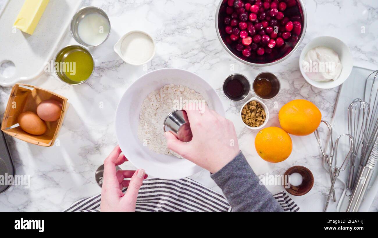 Flat lay. Step by step. Mixing ingredients in a mixing bowl to bake ...