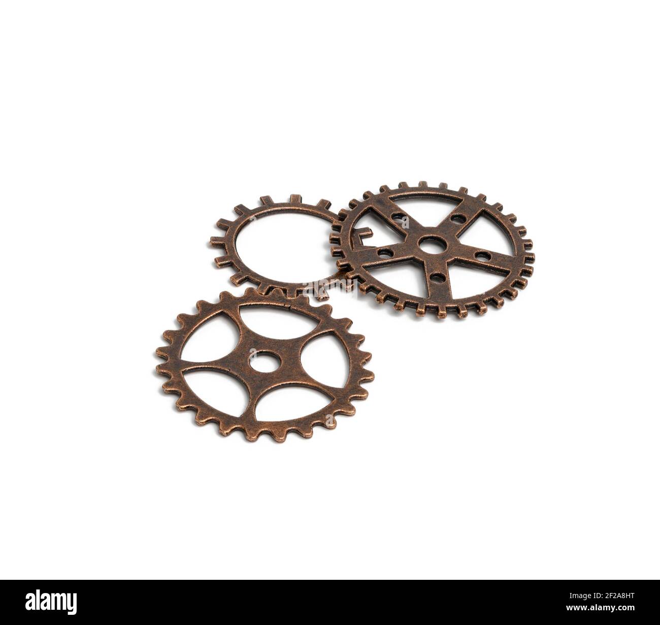 copper various cogs isolated on white background, close up Stock Photo ...