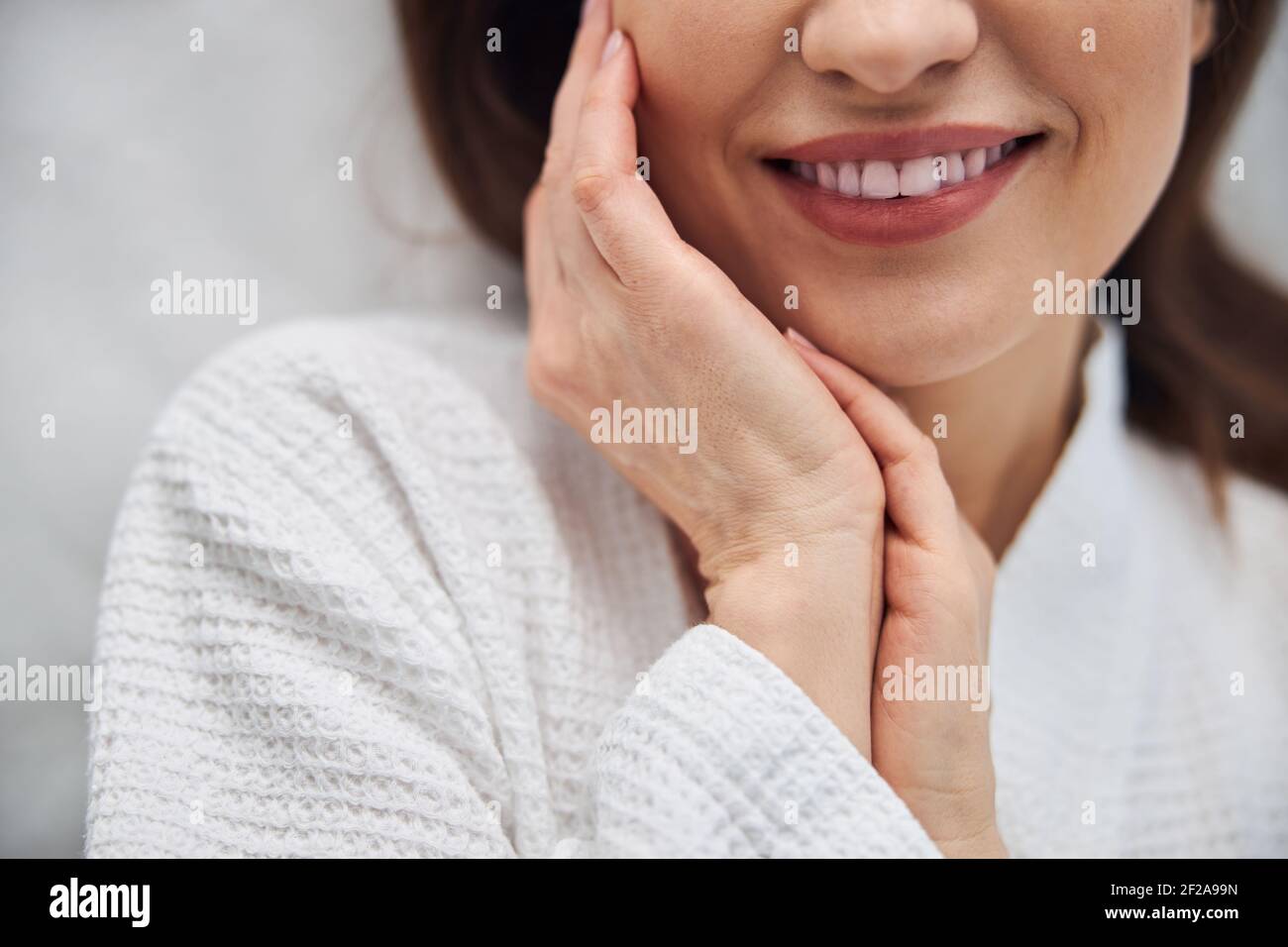 Charming woman with perfect skin expressing positive emotions Stock ...