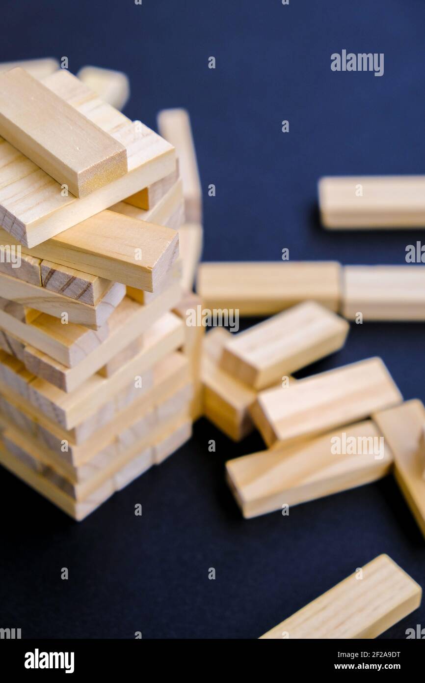 Building from wooden blocks - jenga. Wood blocks stack game with Hand ...