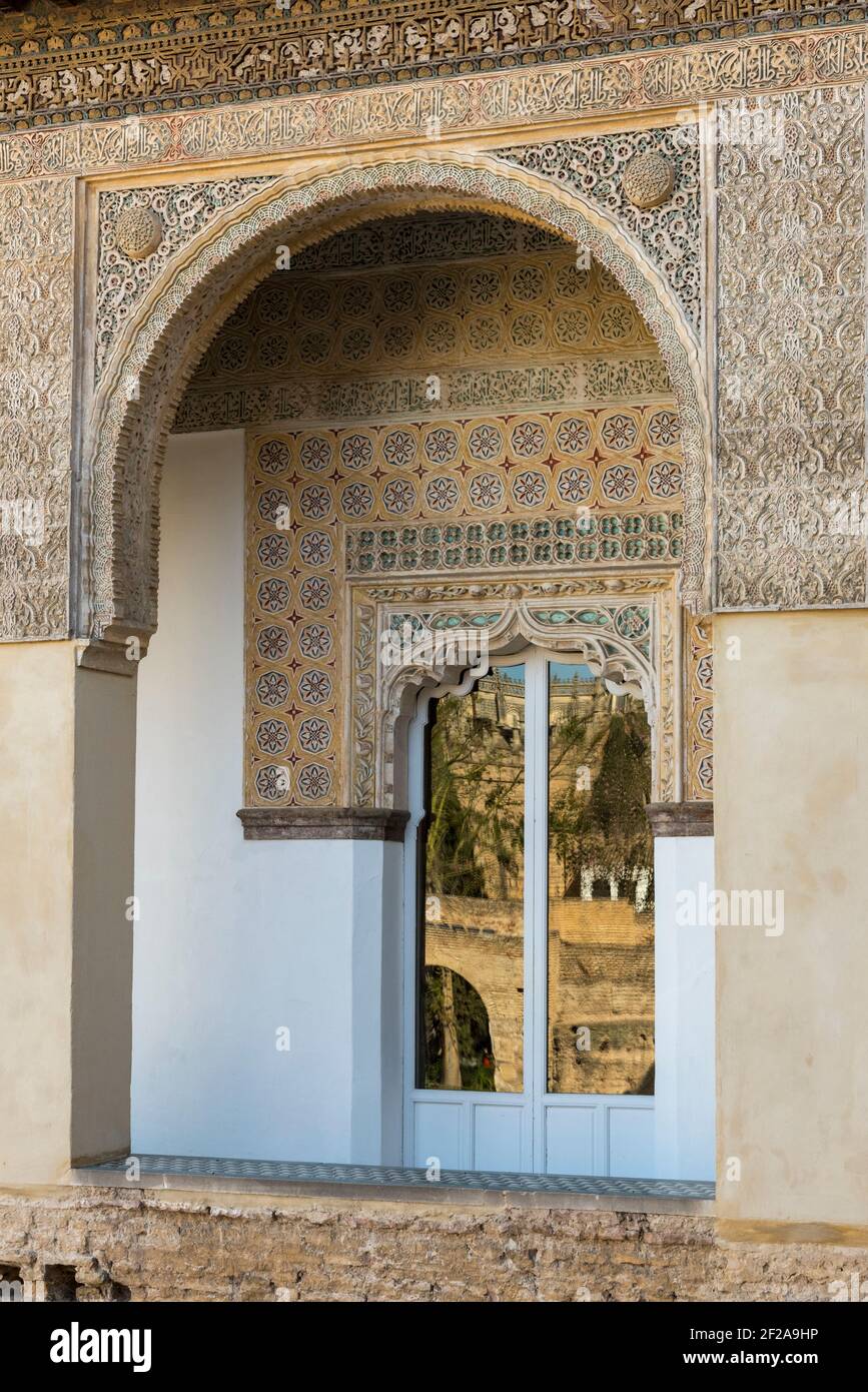 An ornate windows and arches in the Alcazar of Seville, or Alcazar ...