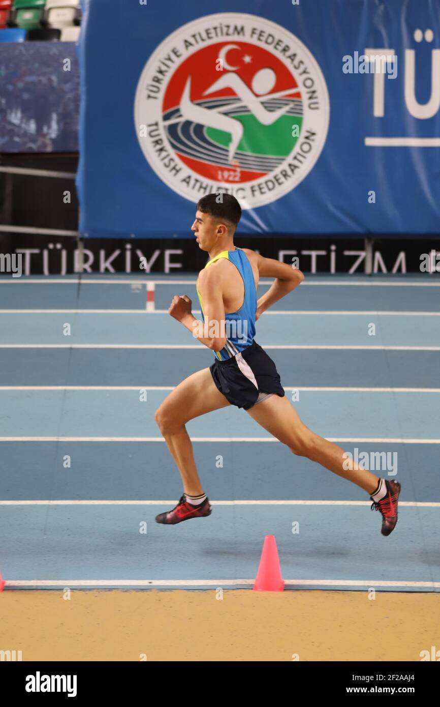 ISTANBUL, TURKEY - JANUARY 30, 2021: Undefined athlete running during ...