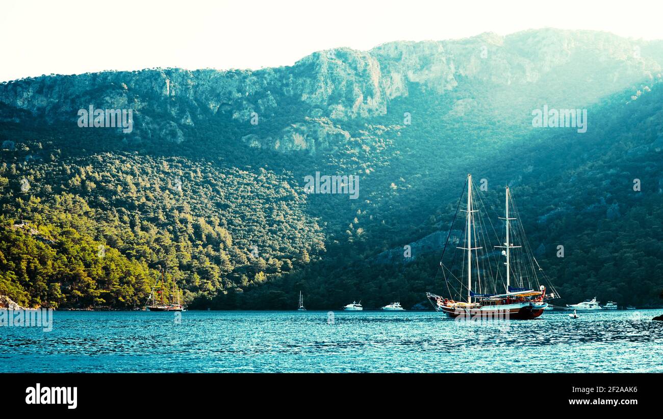 Summer concept: A Turkish gullet yacht anchored at the Aegean sea with ...