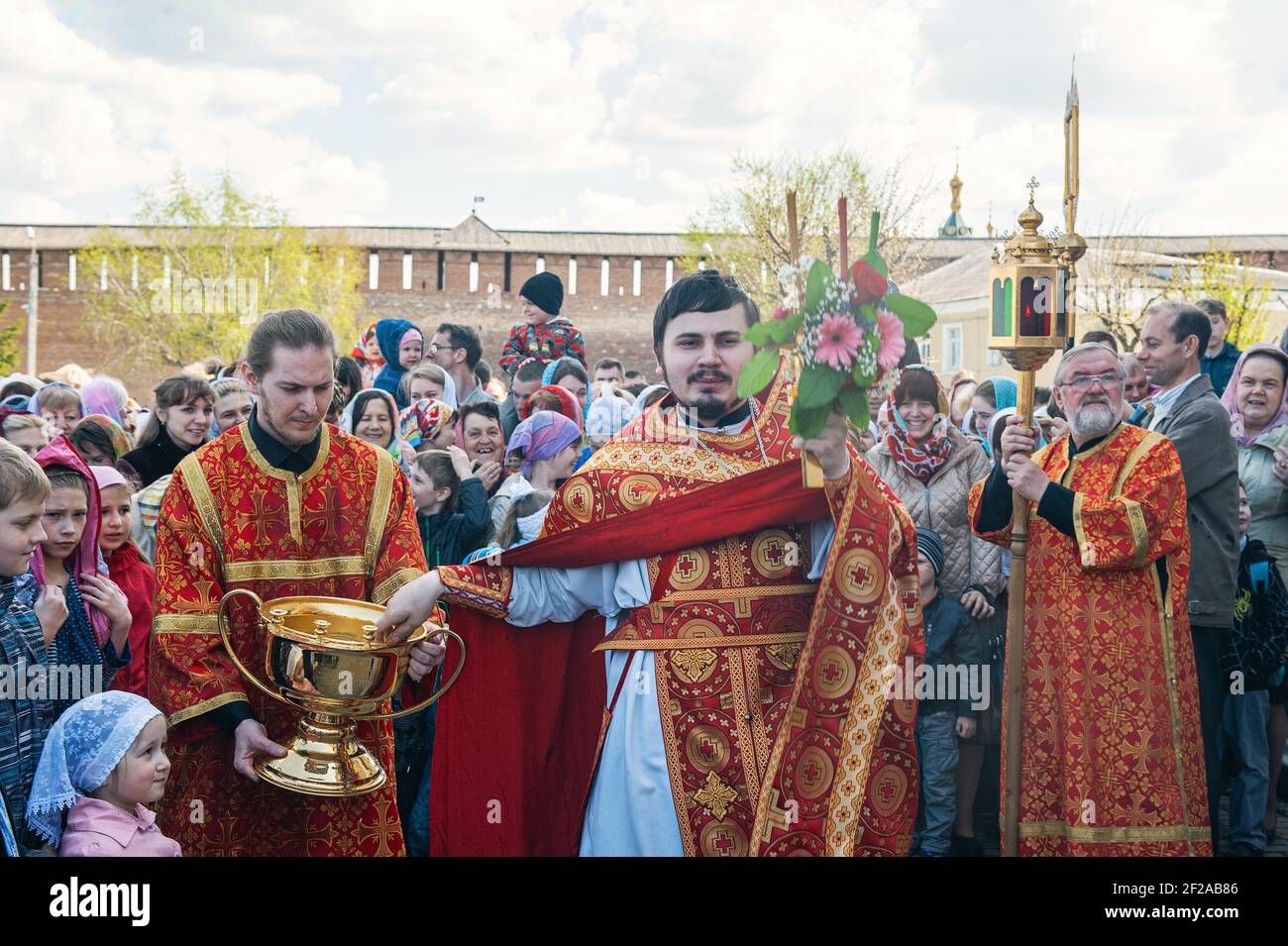Orthodox priest sprinkles holy water hi-res stock photography and ...