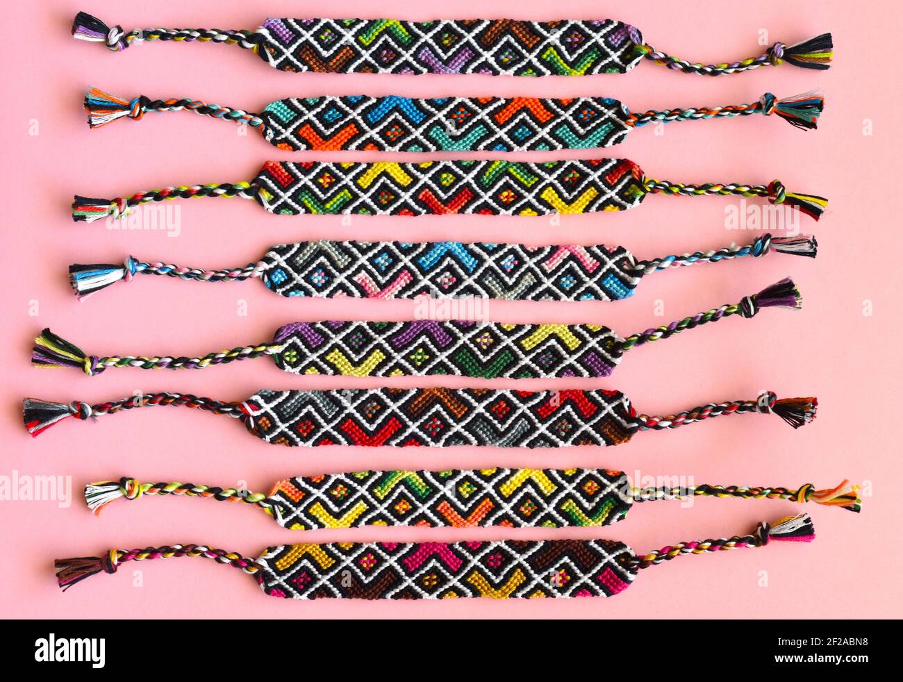DIY woven friendship bracelets with abstract geometric pattern. Summer ...