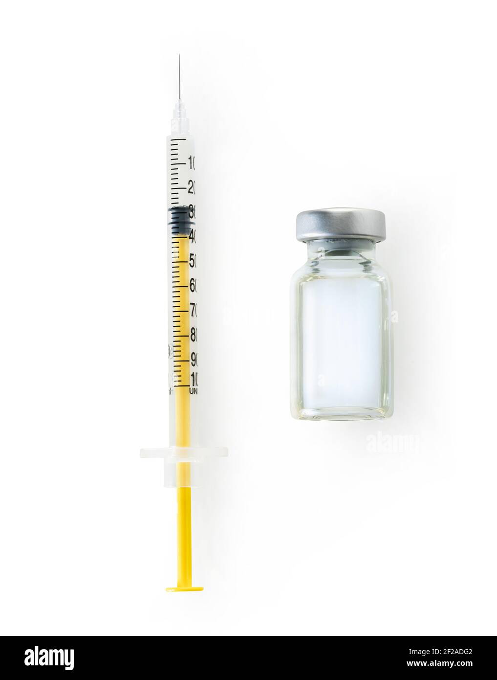 syringe and medicine bottle on white background Stock Photo - Alamy