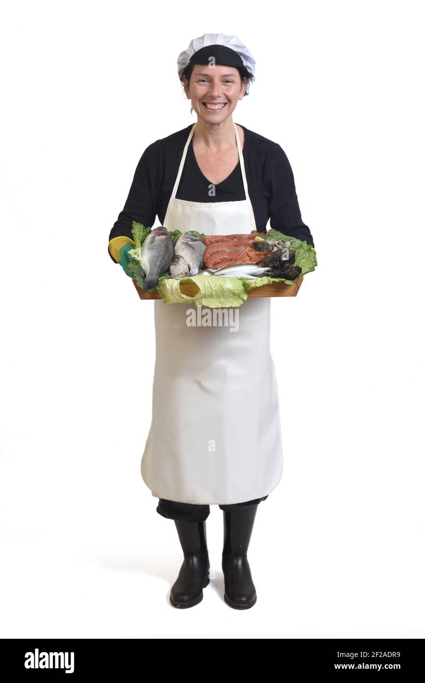 full portrait of a fishmonger showing a plate with fish and seafood on ...