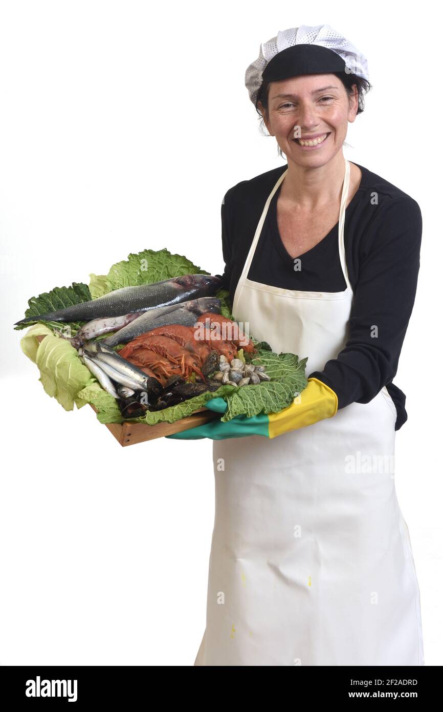portrait of a fishmonger showing a plate with fish and seafood on white ...