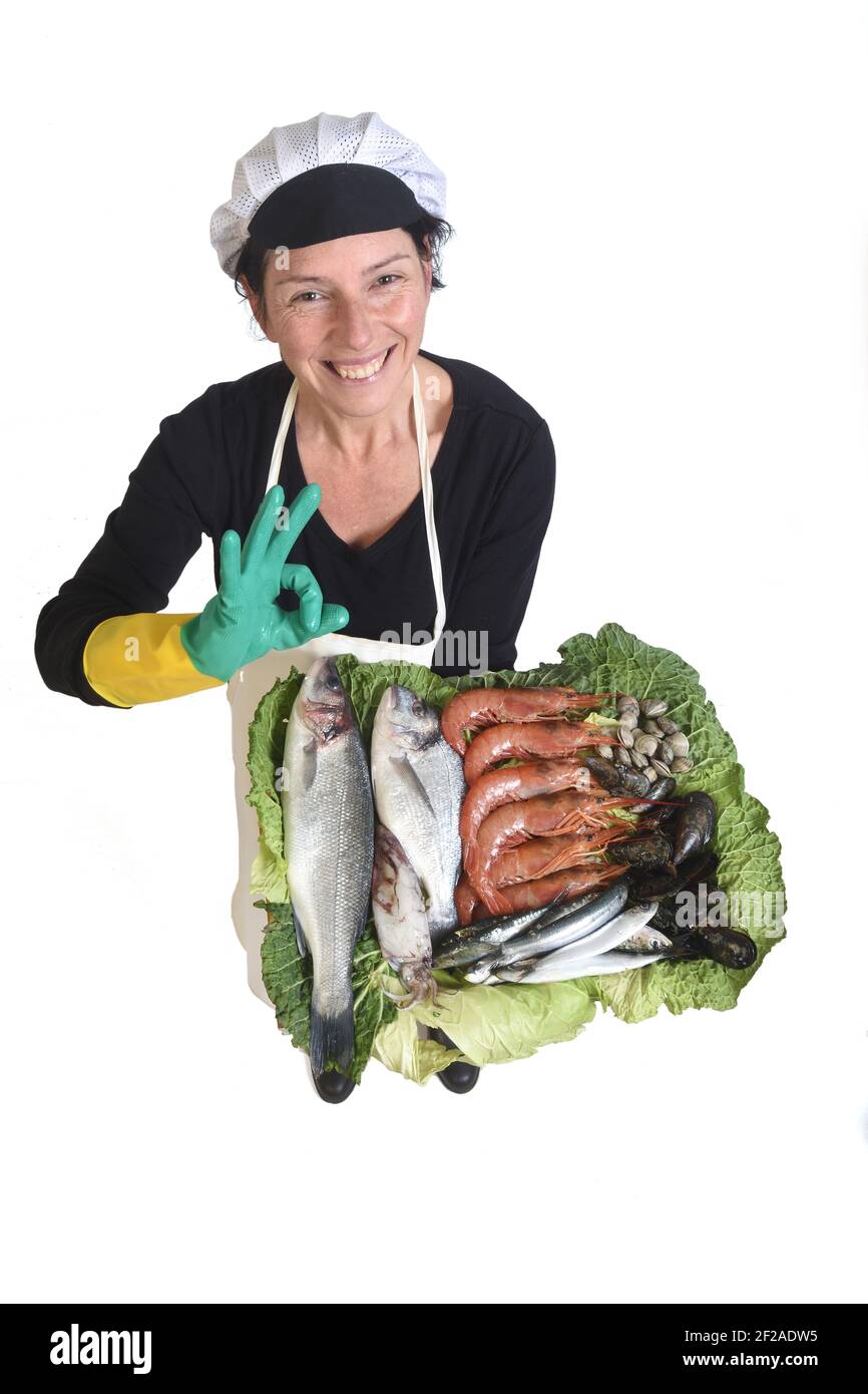 top view of a fishmonger showing a plate with fish and seafood and ...