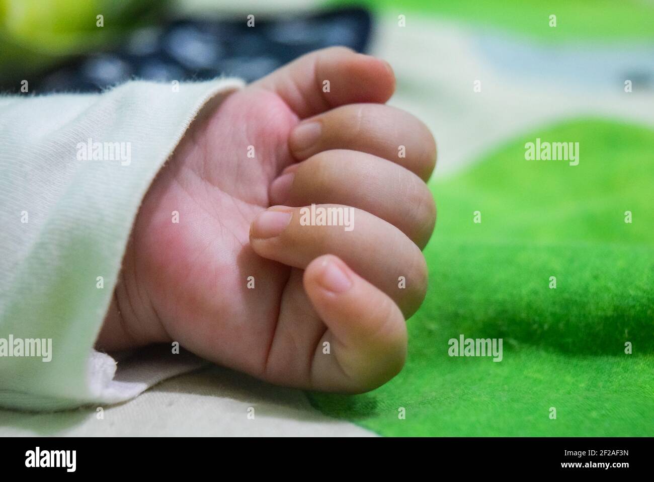 Close up baby hand fingers Stock Photo - Alamy