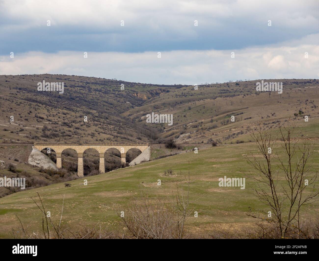 A bridge and hills in the Dobruja region of Romania Stock Photo - Alamy