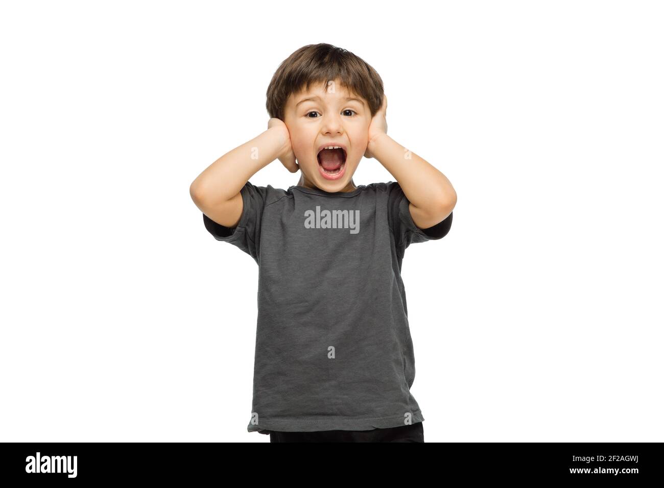 Astonished screaming. Happy, smiley little caucasian boy isolated on ...