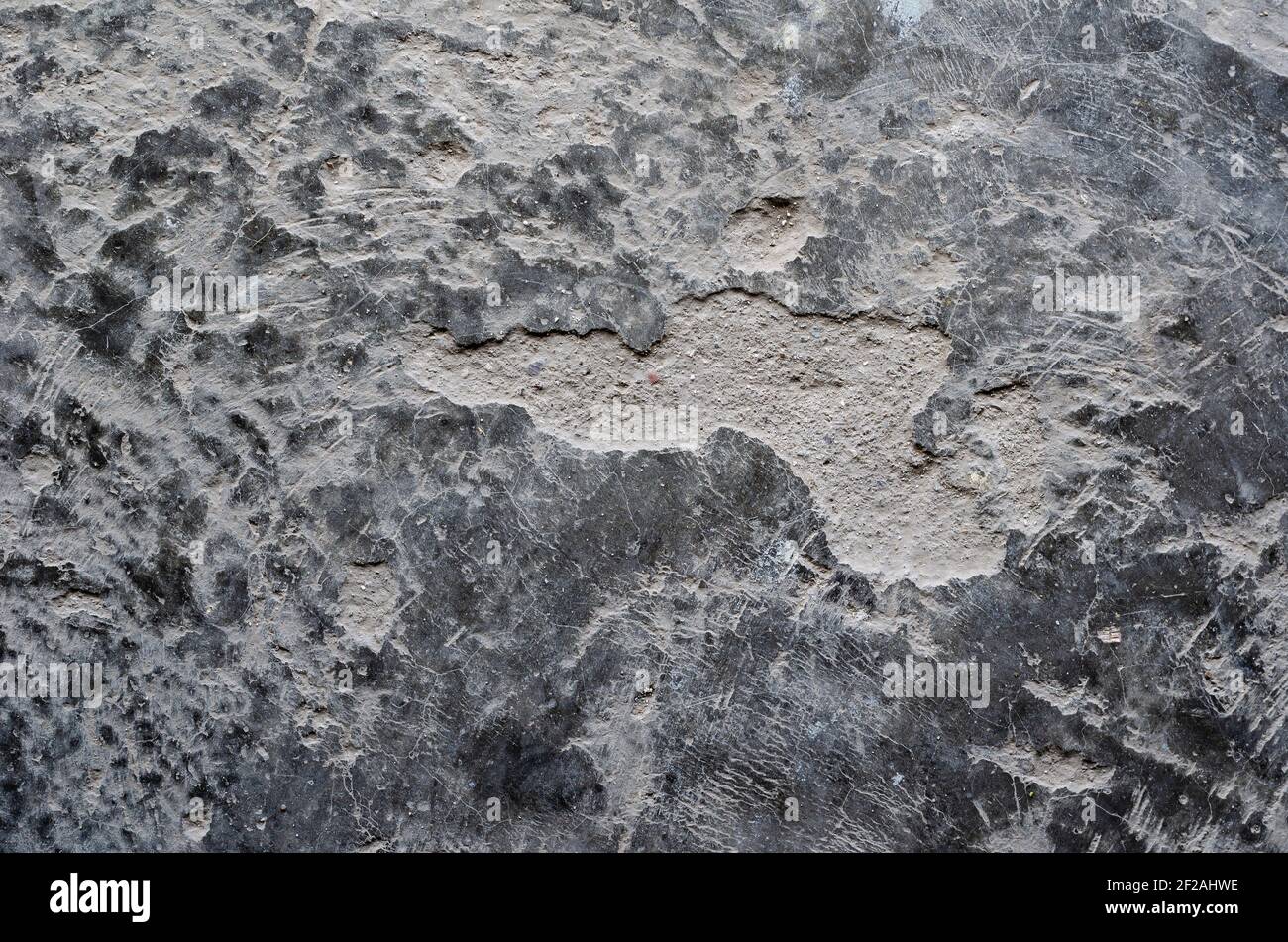 The old gray concrete floor. Texture of cracked and scratched concrete ...