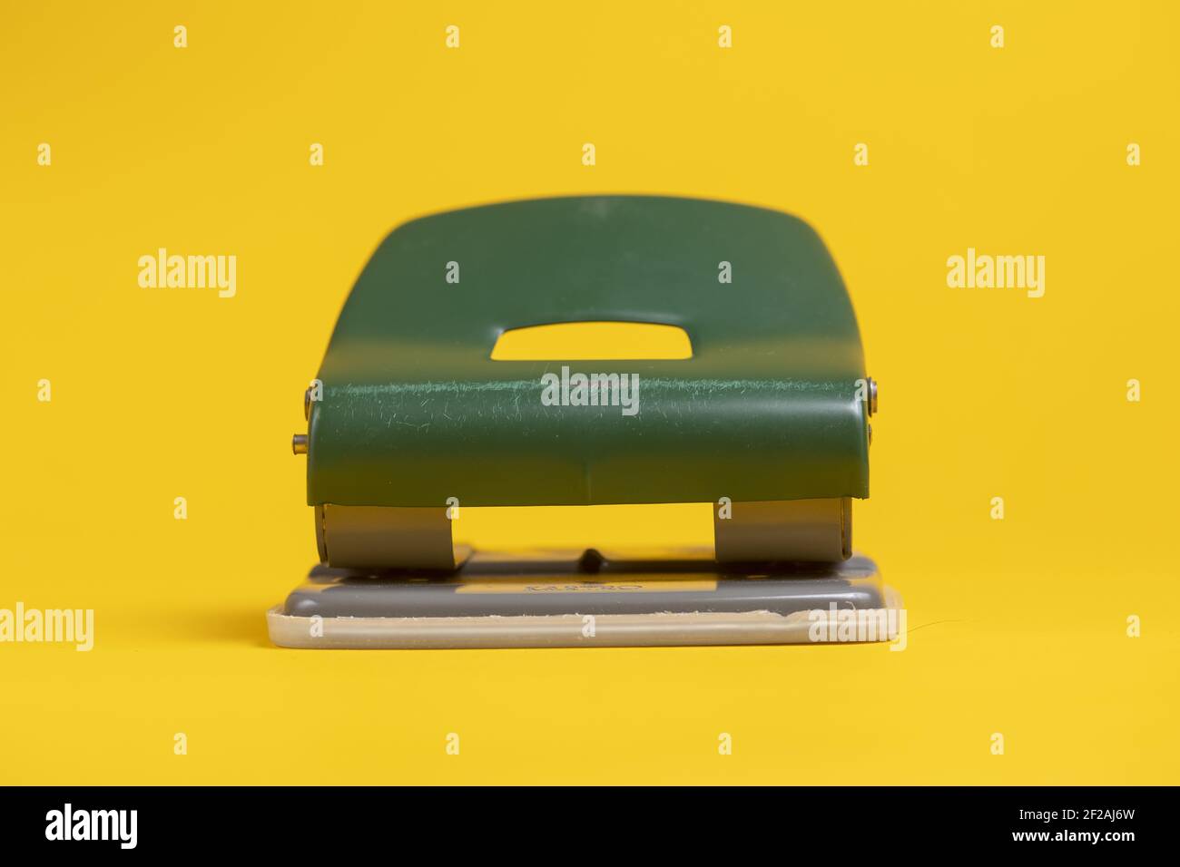 Frontal view of perforator office tool still life against a seamless ...