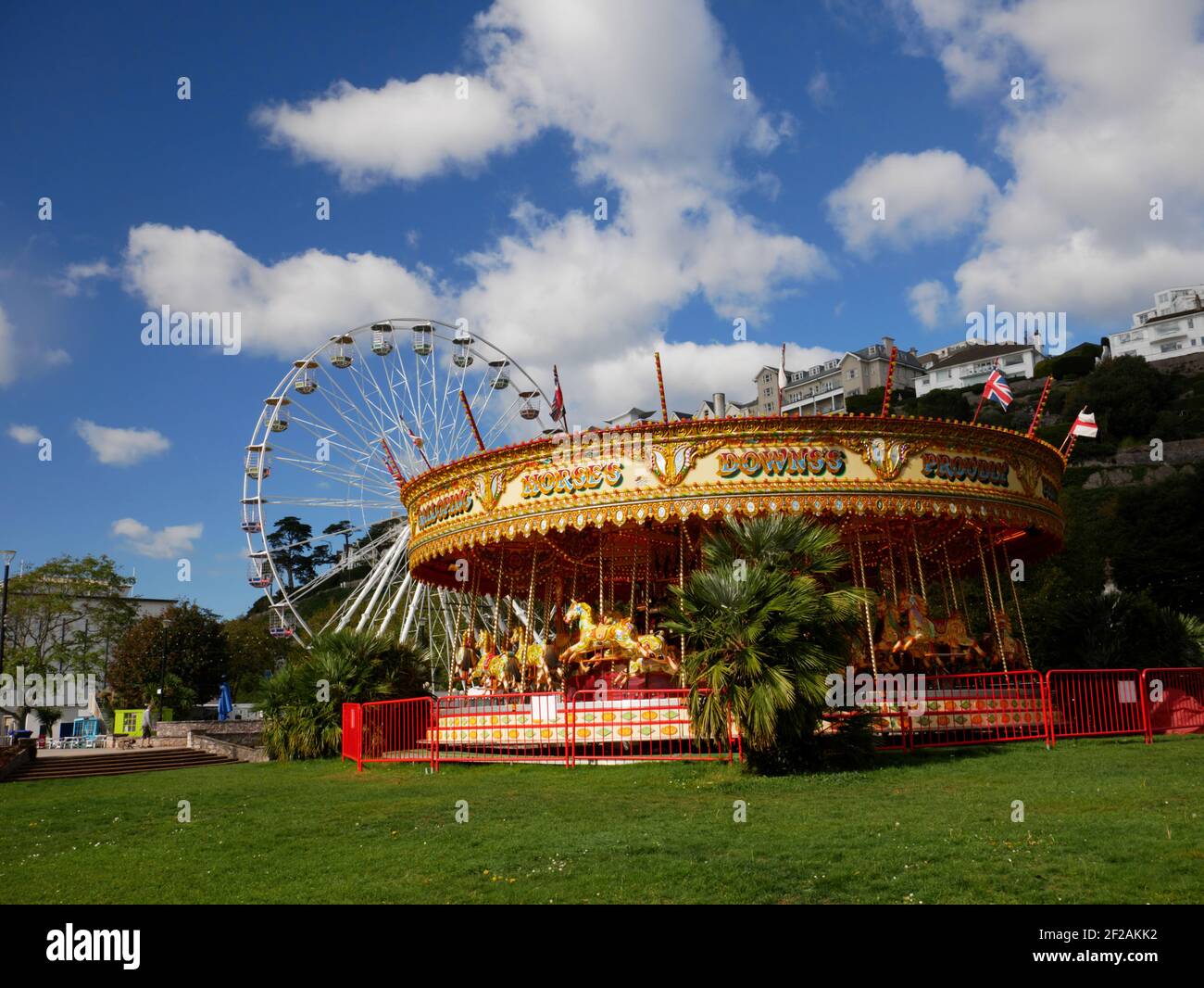 A fairground carousel in Princess Gardens, Torquay, Devon Stock Photo ...