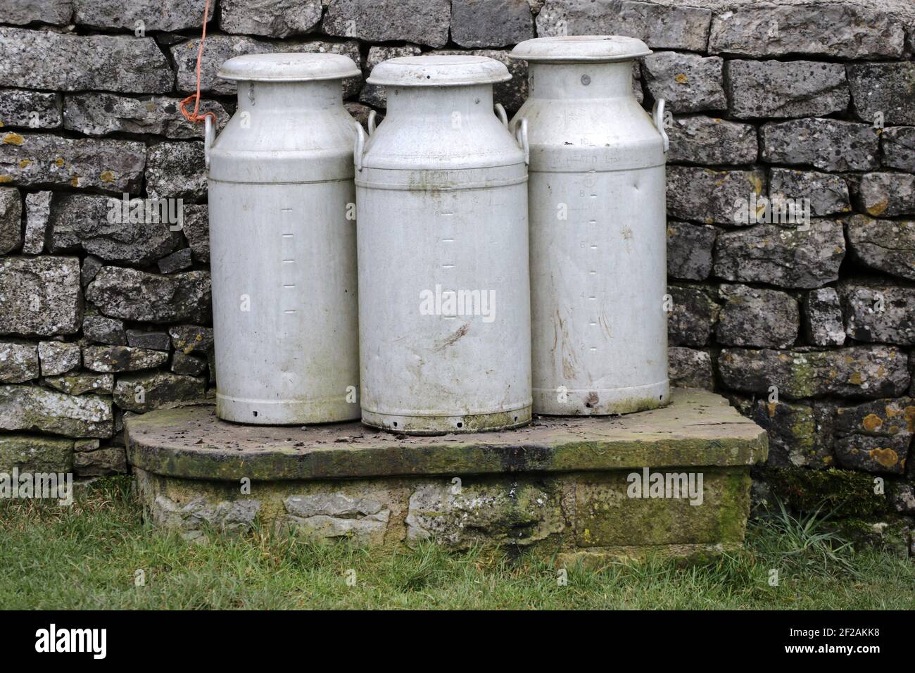 Old milk churns at a farm in the Peak District Stock Photo - Alamy