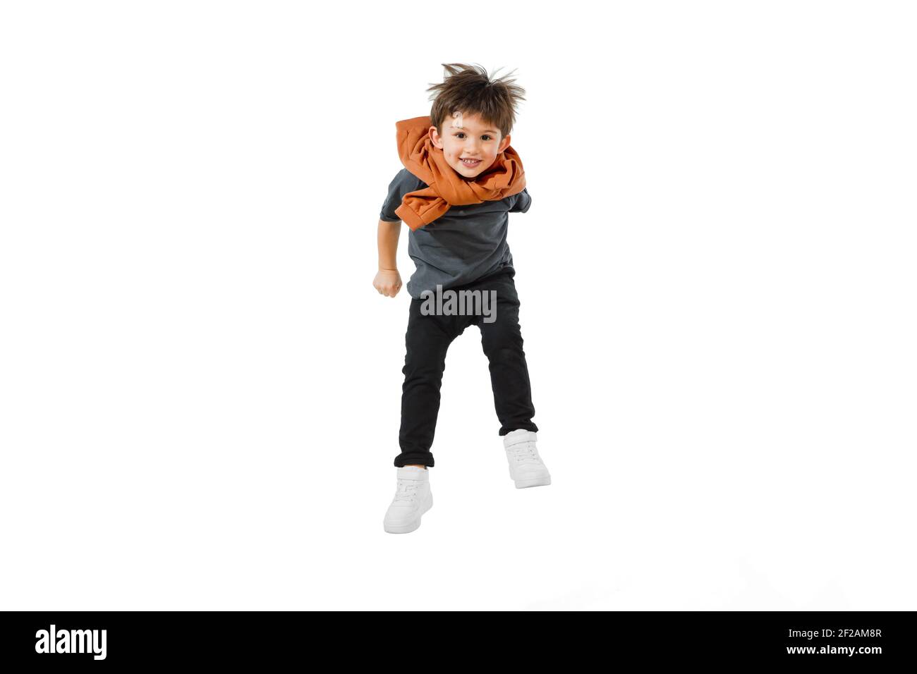 Jumping, flying. Happy, smiley little caucasian boy isolated on white ...