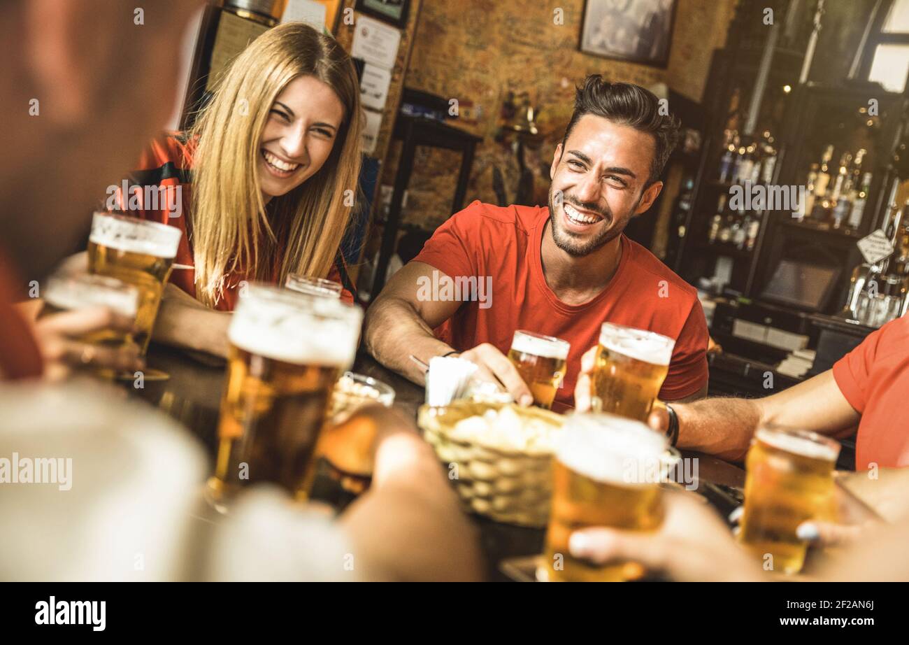 Happy friends group drinking beer at brewery bar restaurant ...