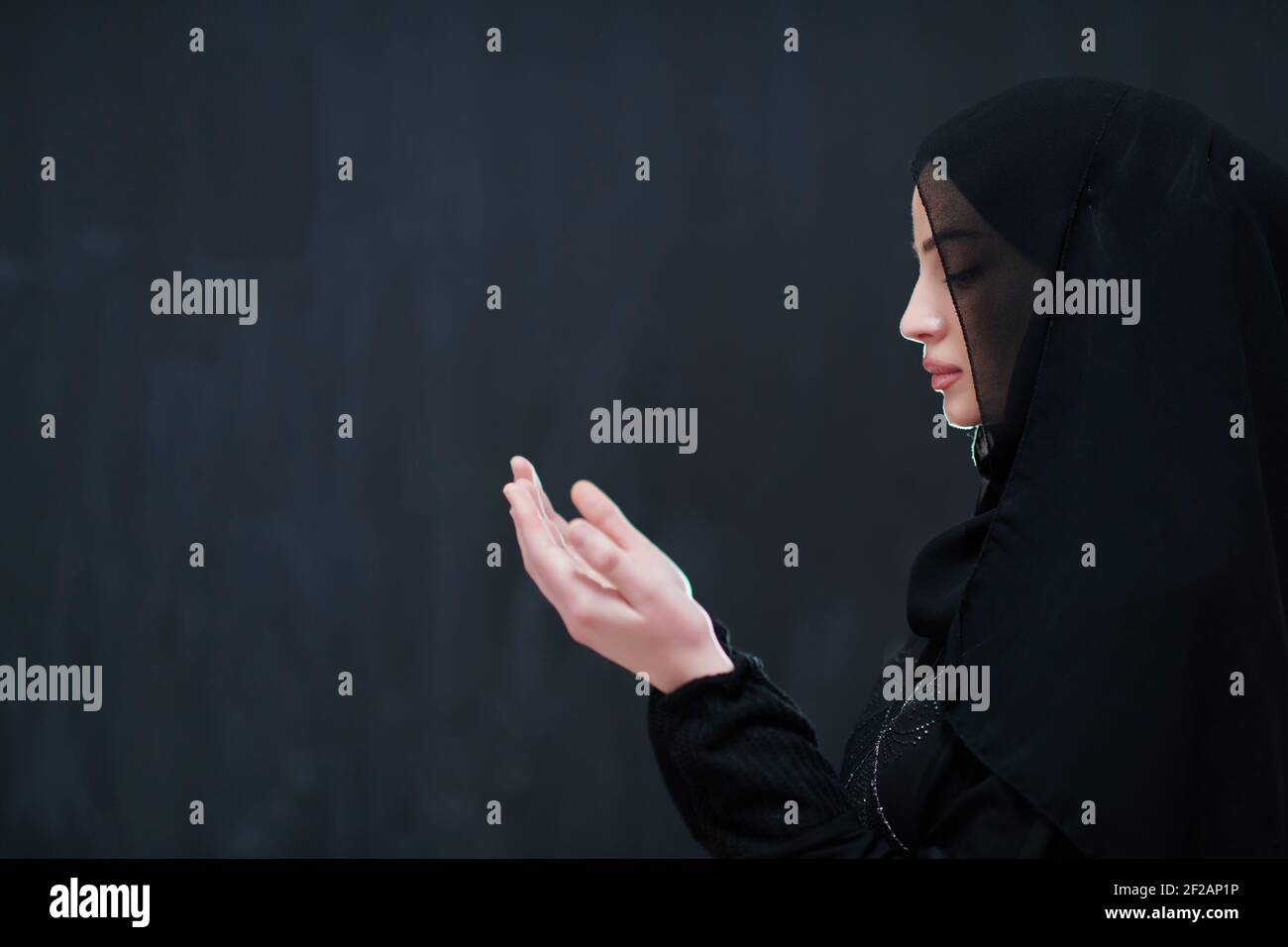 Portrait of young Muslim woman making dua Stock Photo - Alamy