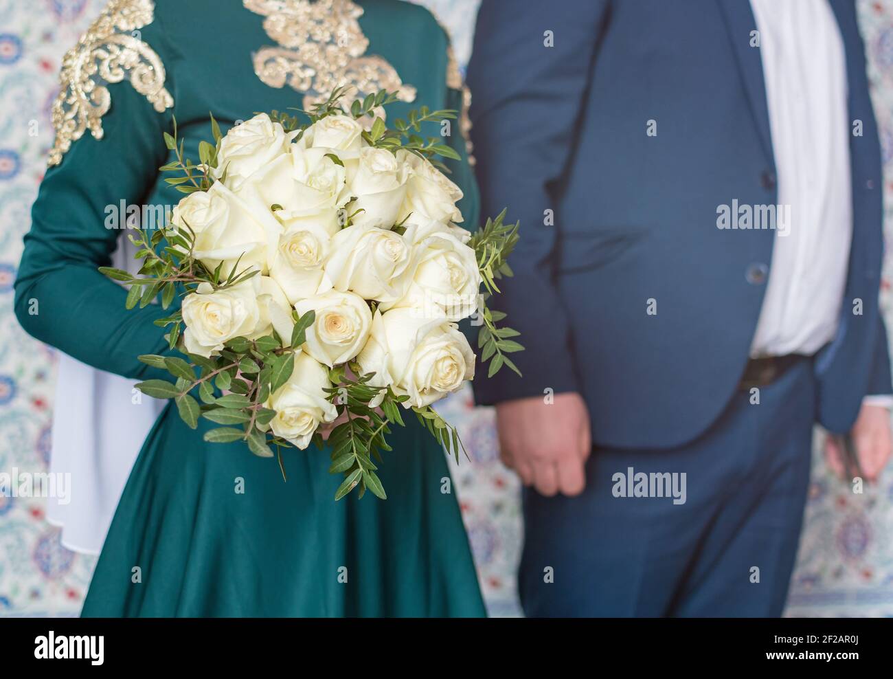 Nikah is a Muslim wedding ceremony. The bride and groom are standing ...