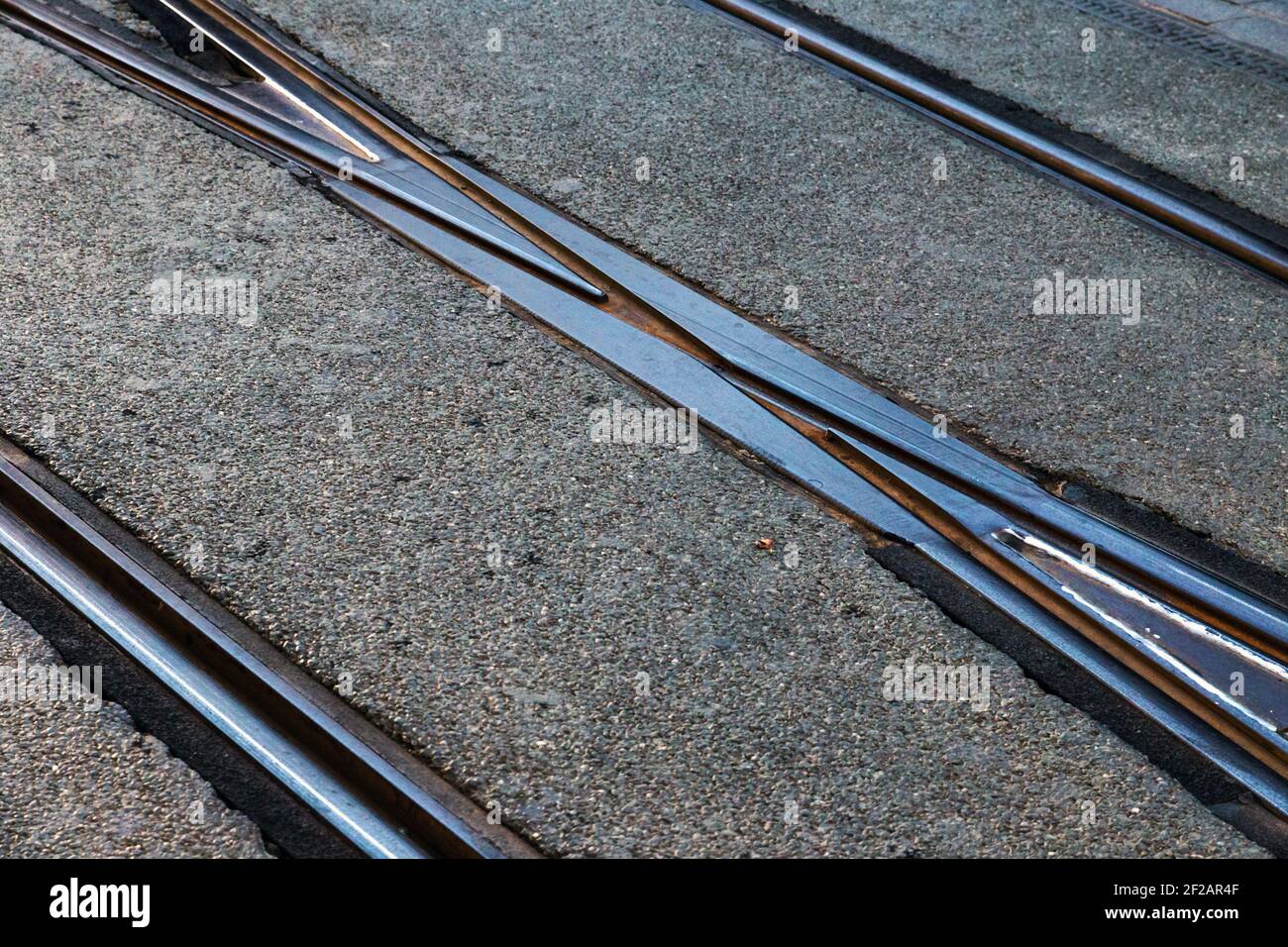 Close up of a tram girder rail switch on concrete paving Stock Photo ...