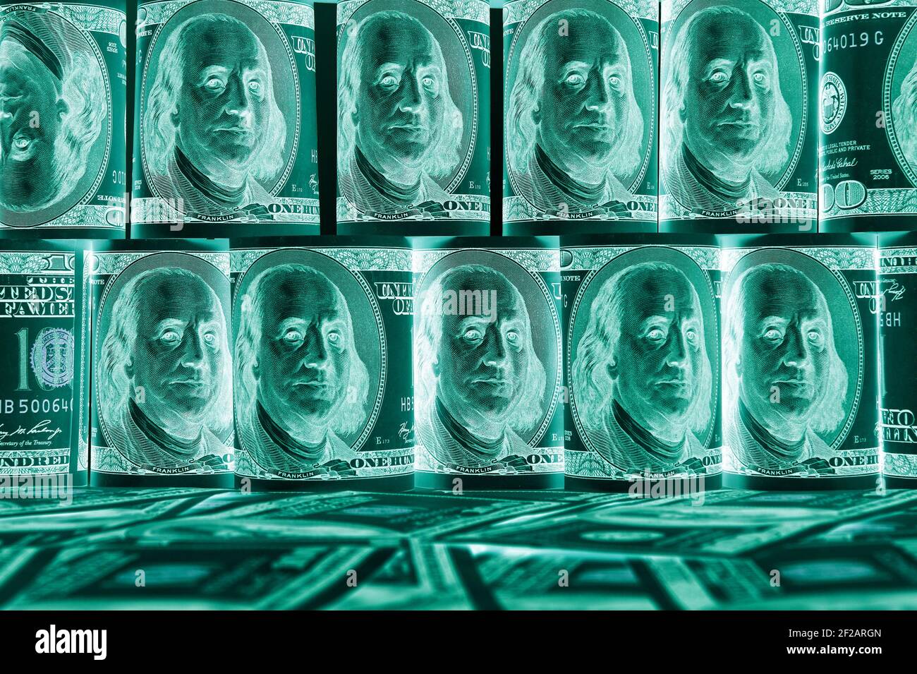 One hundred dollar bills (banknotes ) close up, U.S. currency-- in UV ...