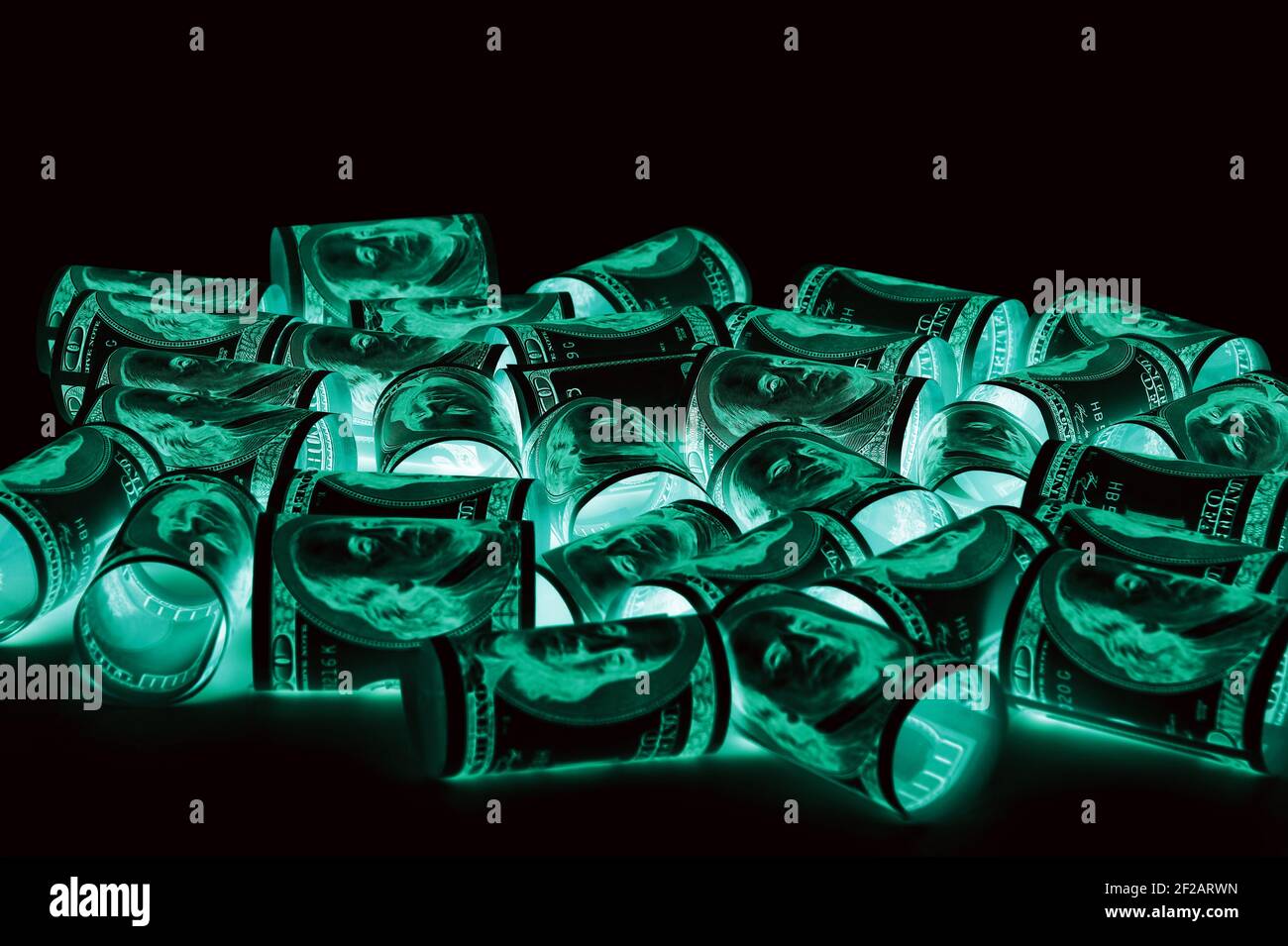 One hundred dollar bills (banknotes ) close up, U.S. currency-- in UV ...