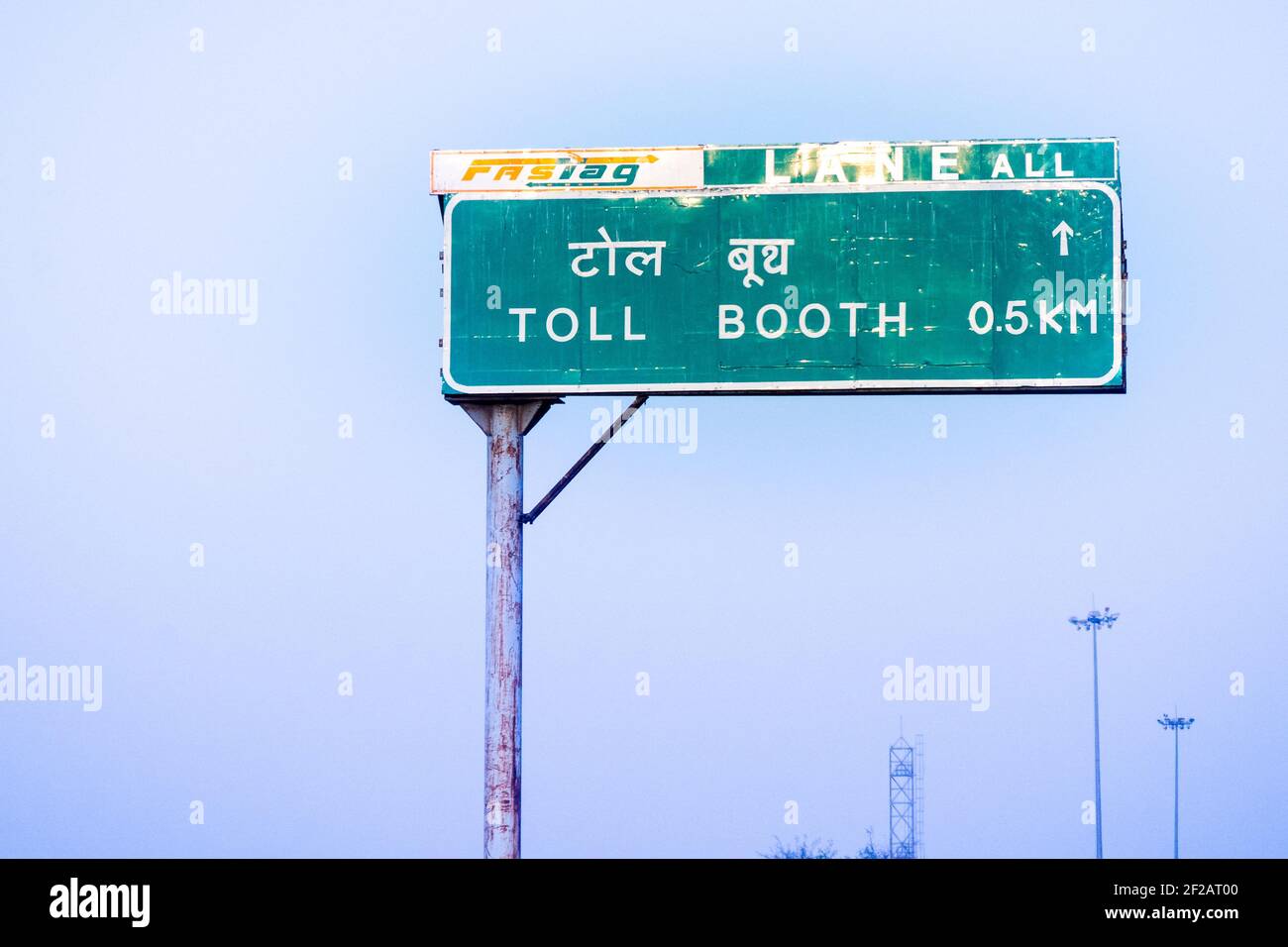 Toll booth sign near a toll booth showing the new cashless RFID based ...