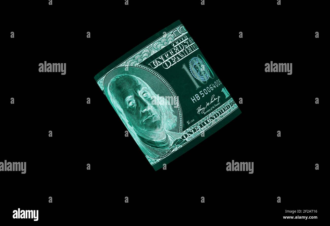 One hundred dollar bills (banknotes ) close up, U.S. currency-- in UV ...