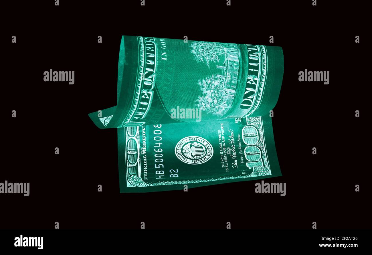 One hundred dollar bills (banknotes ) close up, U.S. currency-- in UV ...