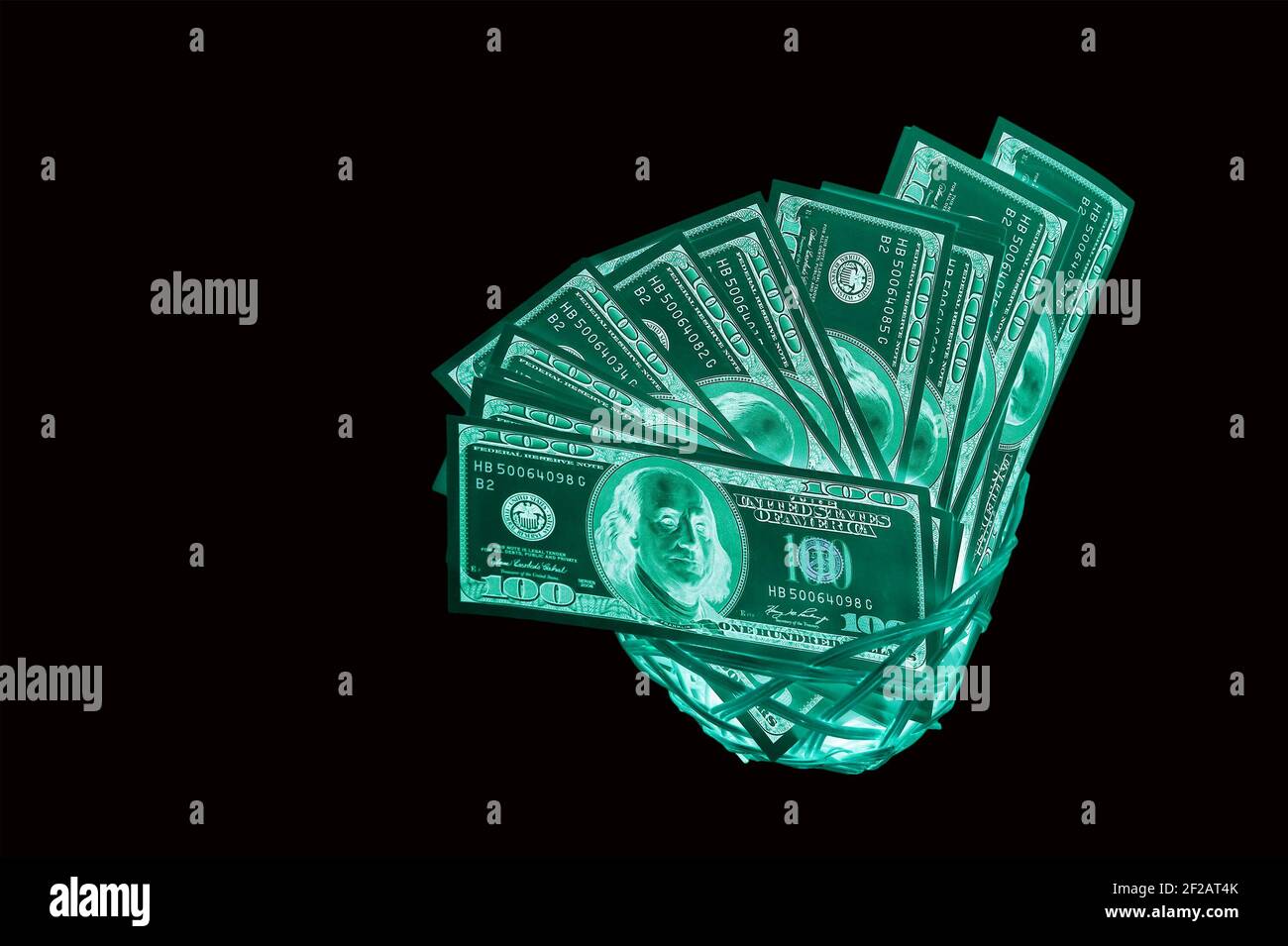 One hundred dollar bills (banknotes ) close up, U.S. currency-- in UV ...