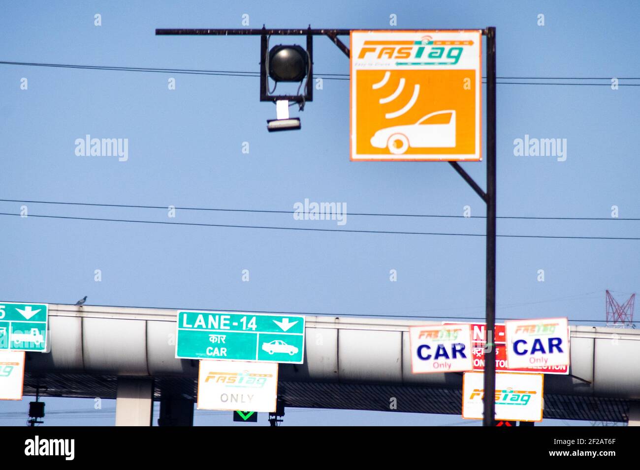 Fast Tag sign near a toll booth showing the new cashless RFID based ...