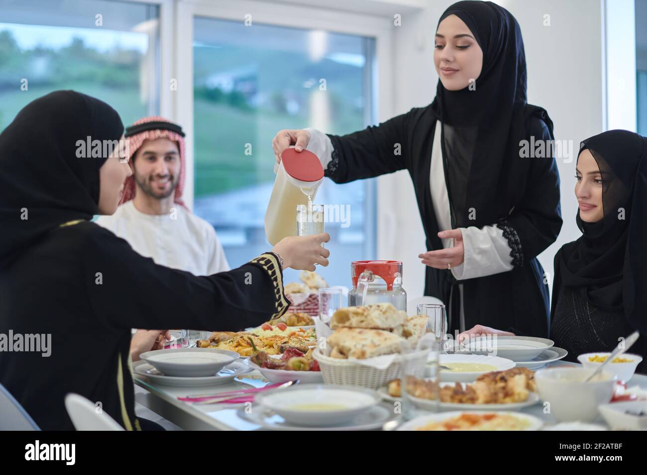 Muslim family having iftar together during Ramadan Stock Photo - Alamy
