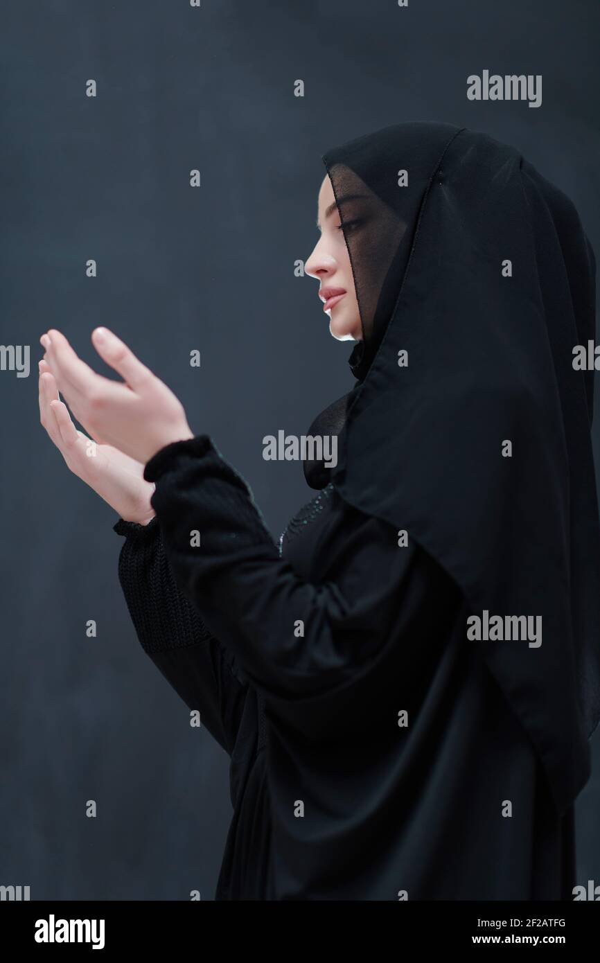 Portrait of young Muslim woman making dua Stock Photo - Alamy