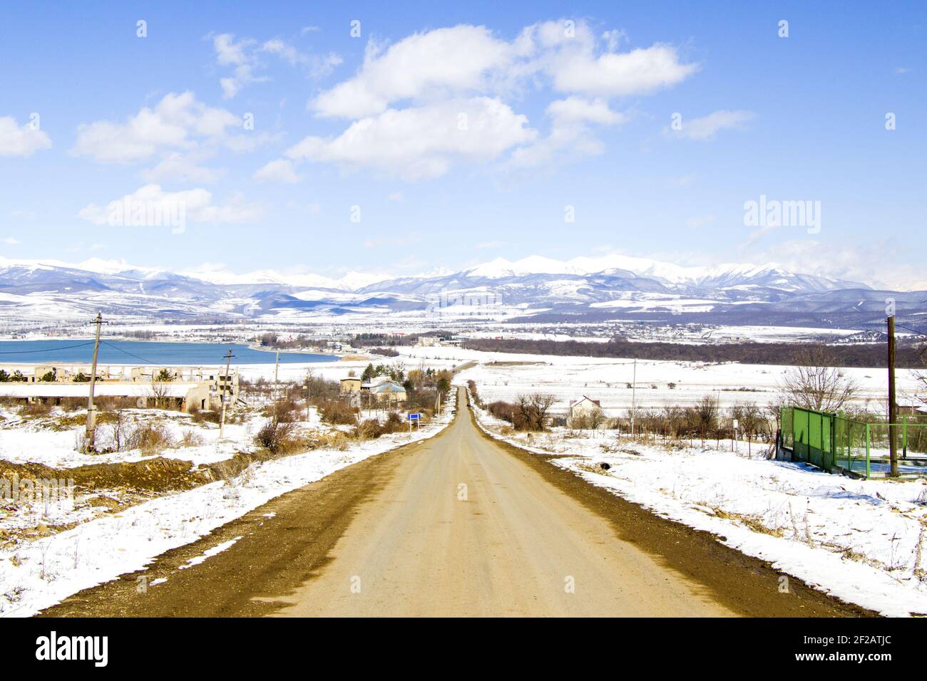 A beautiful shot of a trail with winter mountain scenery in Georgia ...