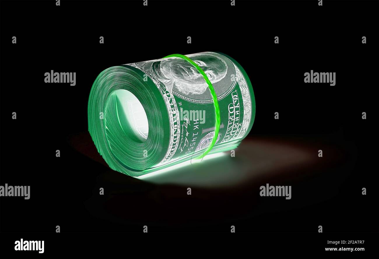 One hundred dollar bills (banknotes ) close up, U.S. currency-- in UV ...