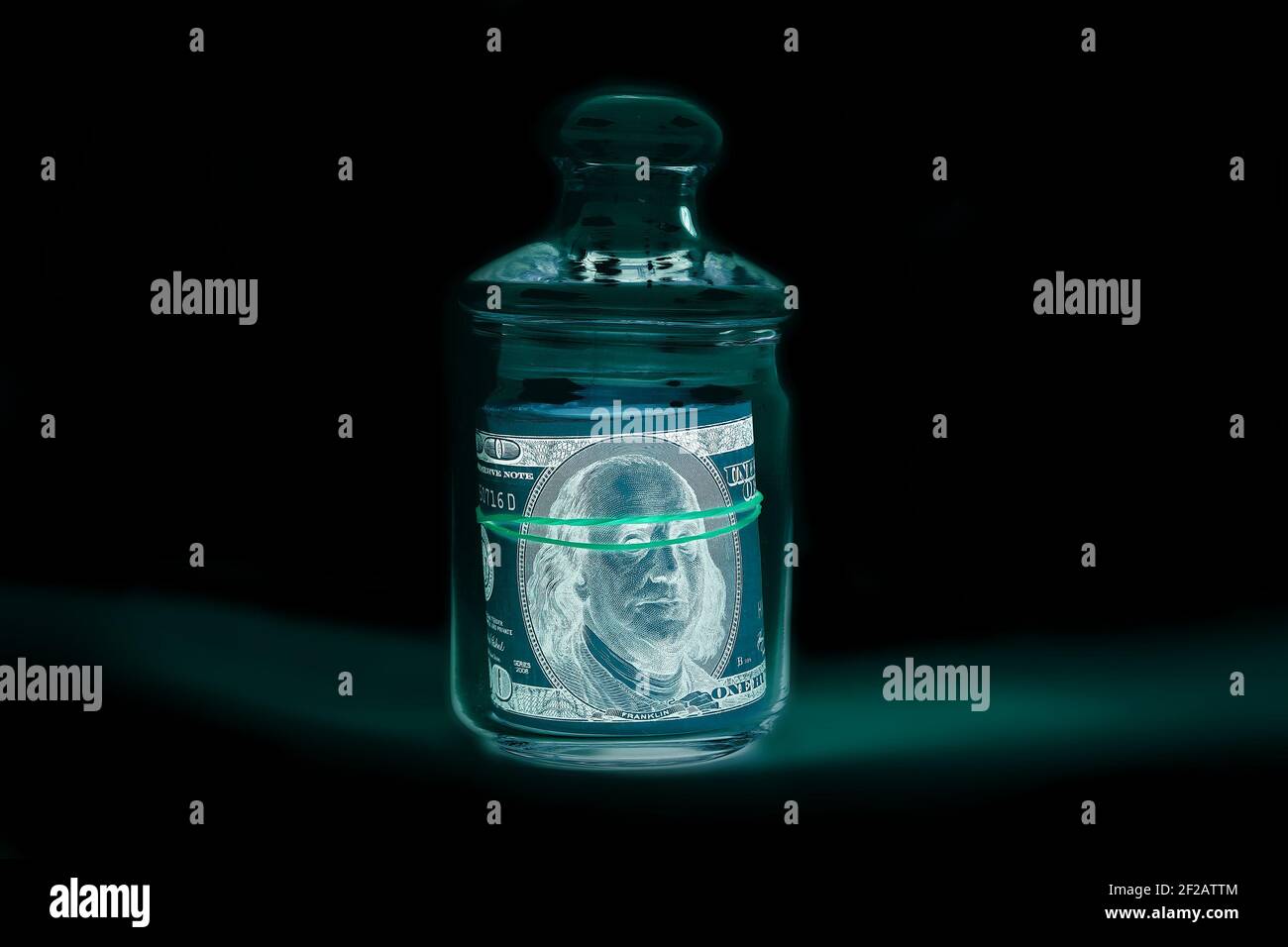 One hundred dollar bills (banknotes ) close up, U.S. currency-- in UV ...