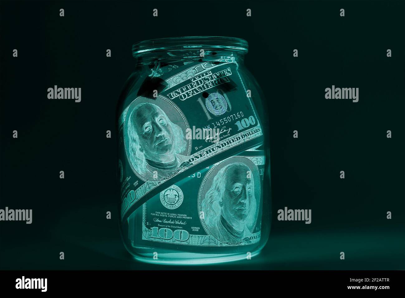 One hundred dollar bills (banknotes ) close up, U.S. currency-- in UV ...