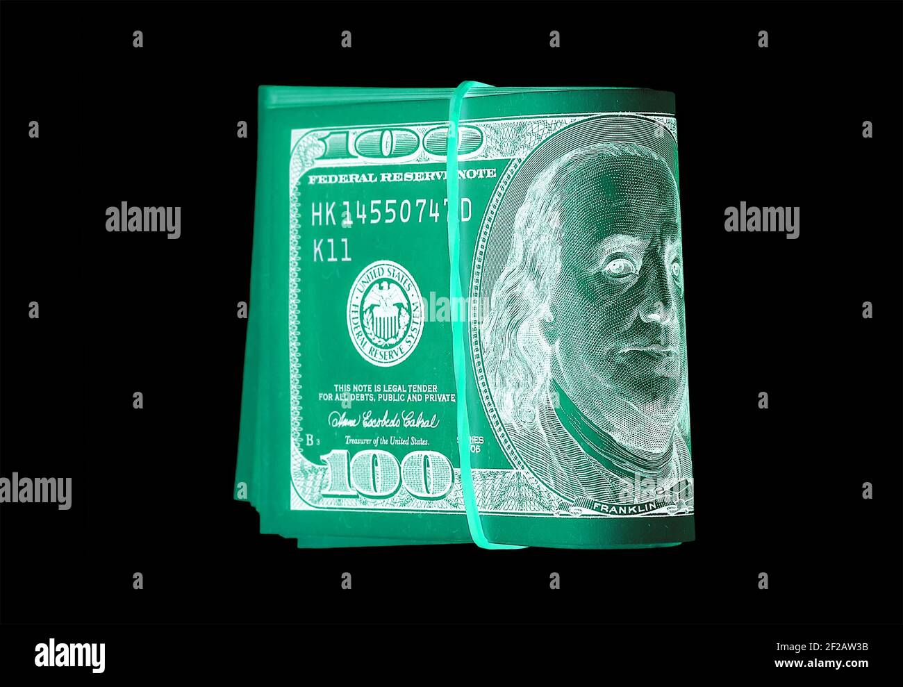 One hundred dollar bills (banknotes ) close up, U.S. currency-- in UV ...
