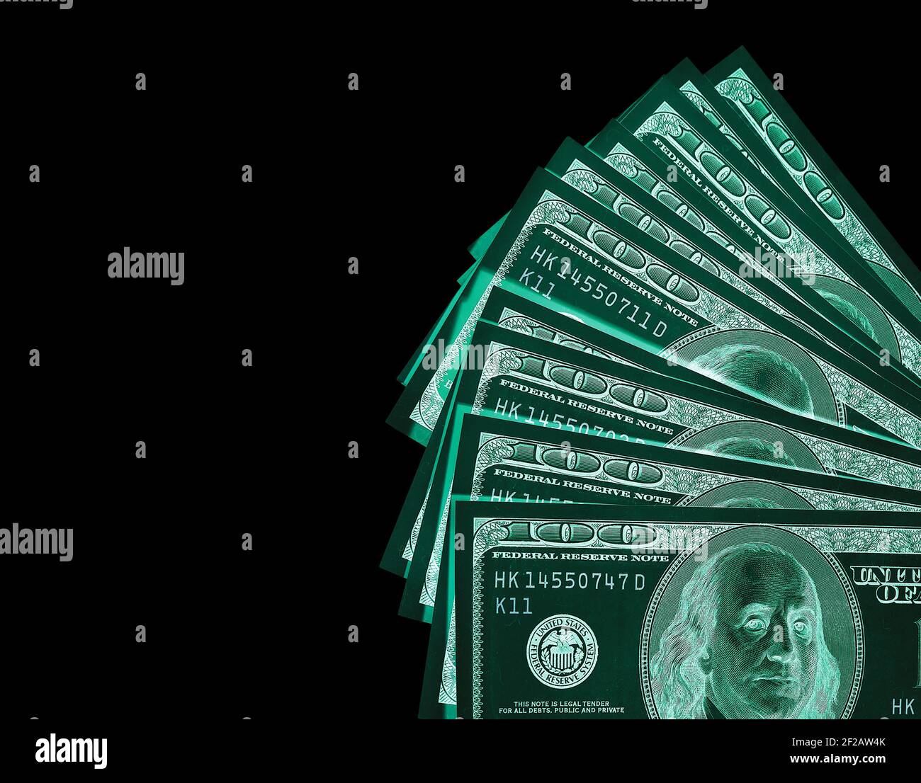 One hundred dollar bills (banknotes ) close up, U.S. currency-- in UV ...