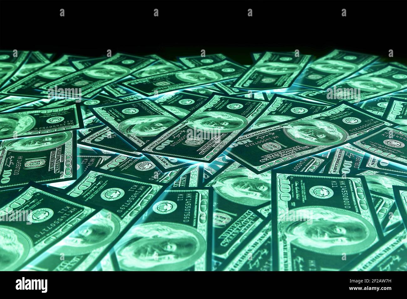 One hundred dollar bills (banknotes ) close up, U.S. currency-- in UV ...