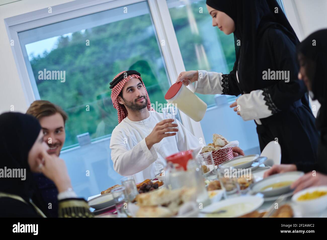 Muslim family having iftar together during Ramadan Stock Photo - Alamy