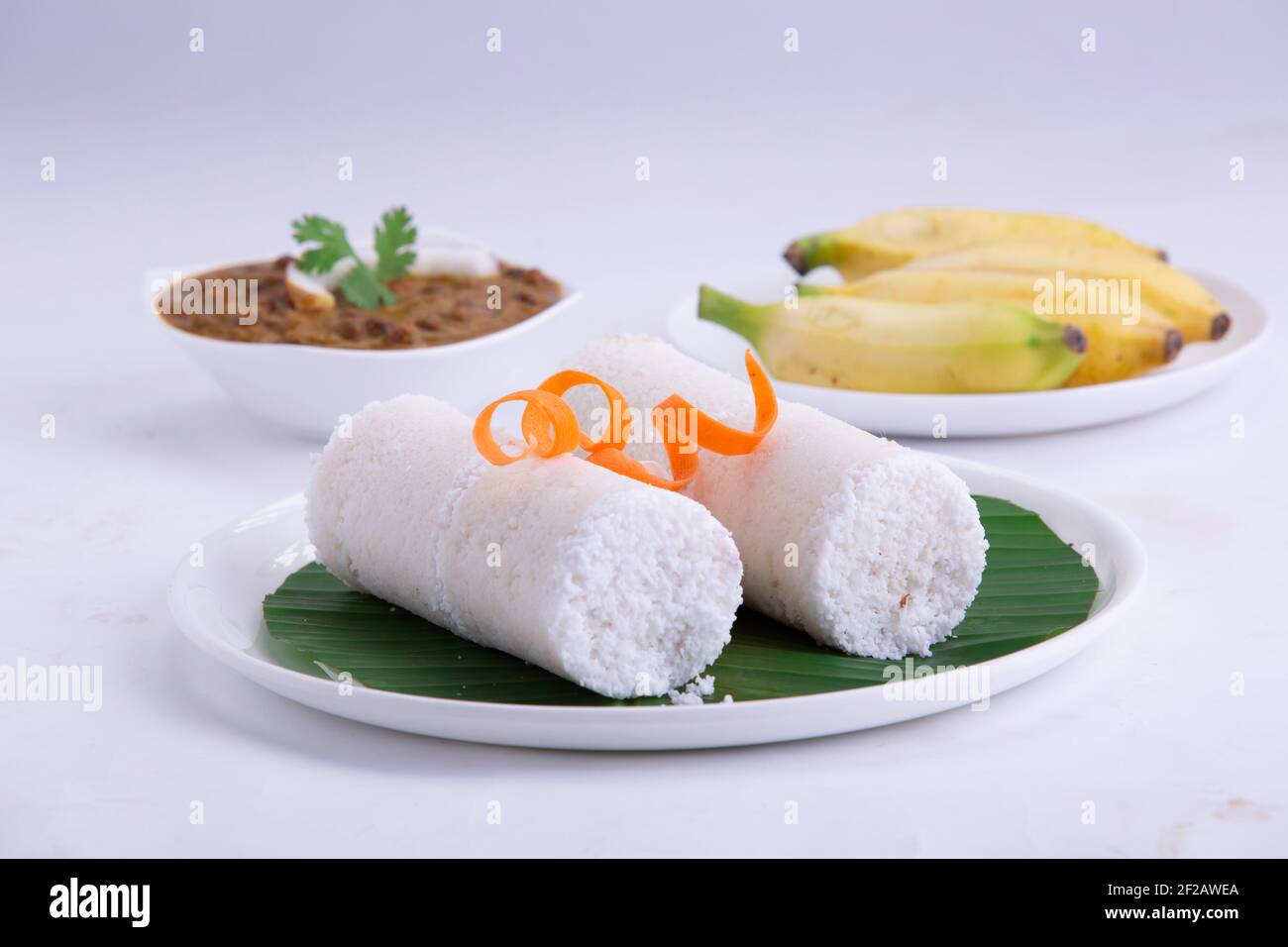 Puttu, steam cake ,white raw rice puttu , pacharisi maavu puttu with ...
